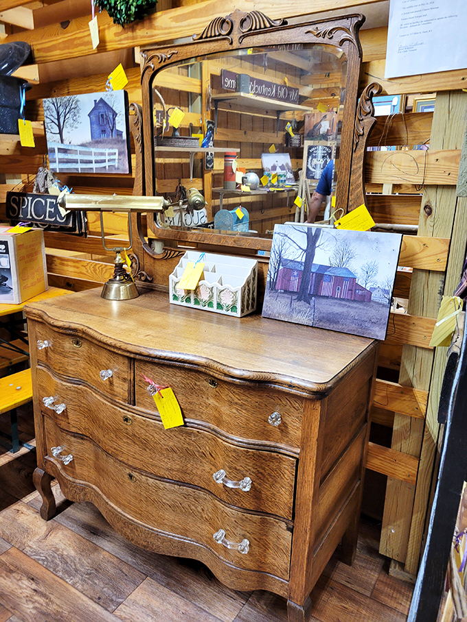 This isn't just furniture &ndash; it's functional art. The antique oak dresser with beveled mirror waits patiently for its next century of holding someone's treasures.