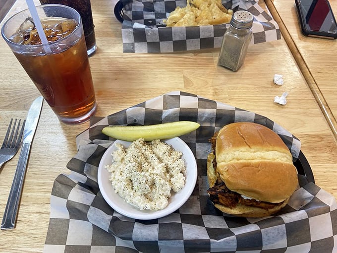 The sandwich that launched a thousand napkins. That side of homemade potato chips isn't just a garnish &ndash; it's essential supporting cast.