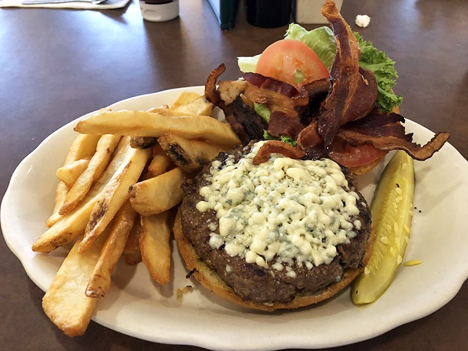 This isn't just a burger—it's a monument to American ingenuity. Blue cheese and bacon join forces to remind you why you have taste buds.