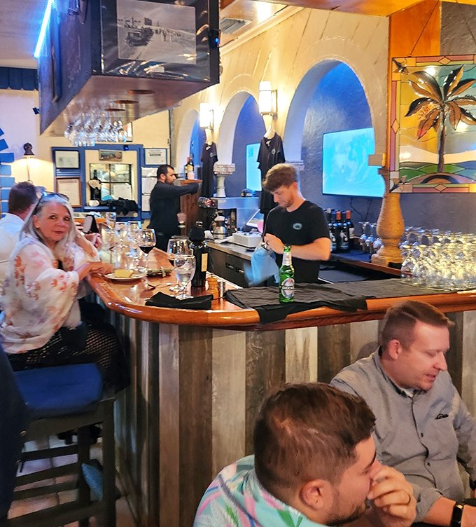 The bar area: where locals gather to debate important issues like which sauce pairs best with the catch of the day.