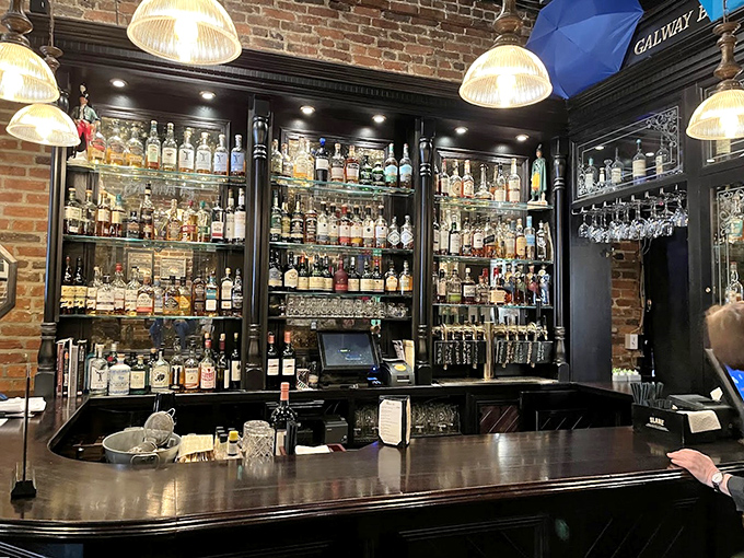 Behind this impressive bar lies liquid poetry – rows of Irish whiskey that would make a Dublin bartender weep tears.