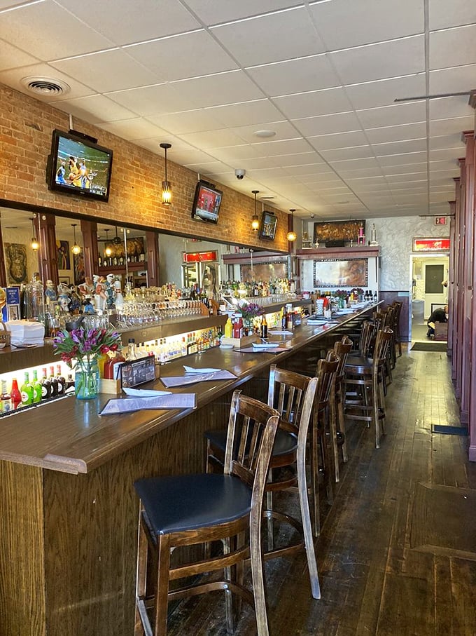 Wooden barstools await their next patrons like front-row seats to culinary theater, where the star of the show is simplicity done spectacularly right.
