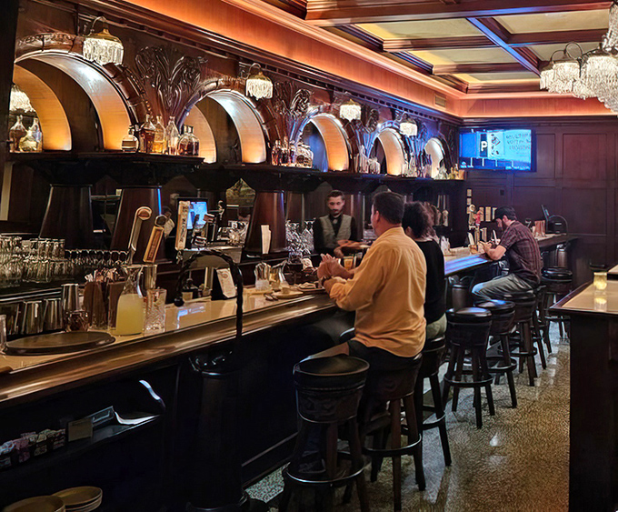 The bar where Old Fashioneds are actually fashioned the old way. Wood, brass, and bartenders who know the difference between shaken and stirred.