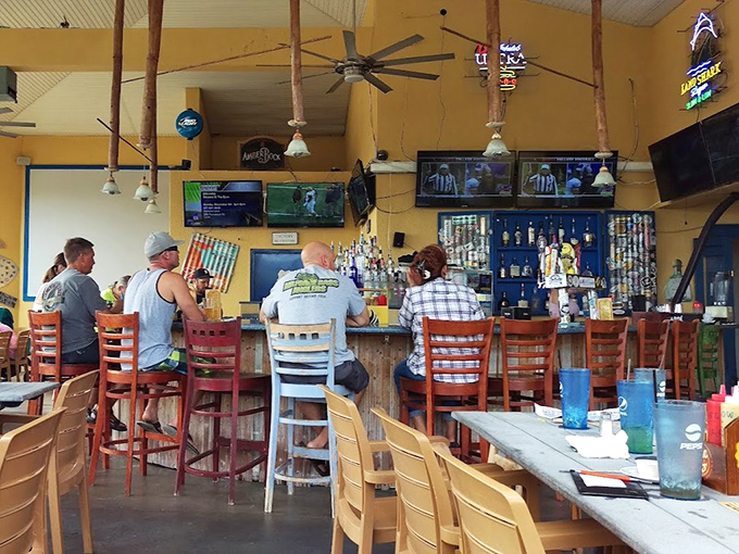 The bar area&mdash;where barbecue stories get better with each telling. Those high-backed chairs have heard it all.