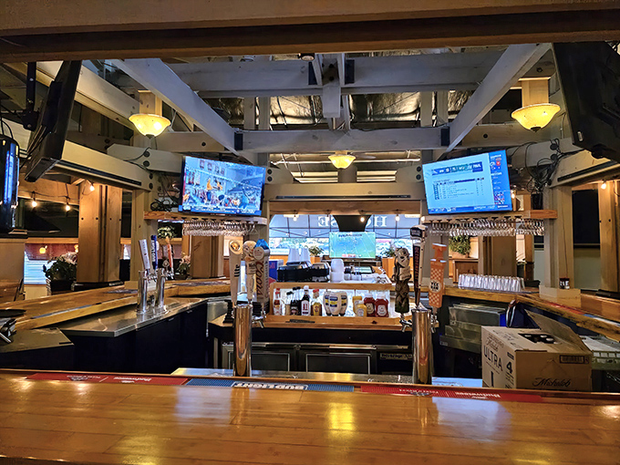 The bar area offers another dimension to the Trailhead experience &ndash; a place where stories flow as freely as the beverages.