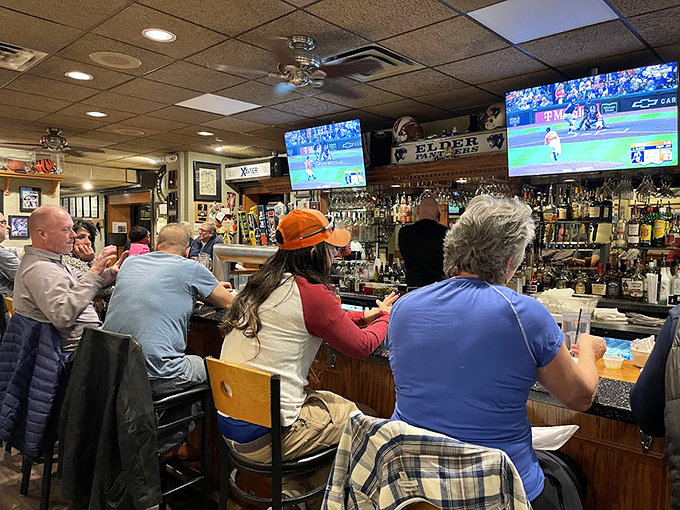 The bar area transforms into Cincinnati's living room during game days, where strangers become friends and every home run is celebrated like New Year's Eve.