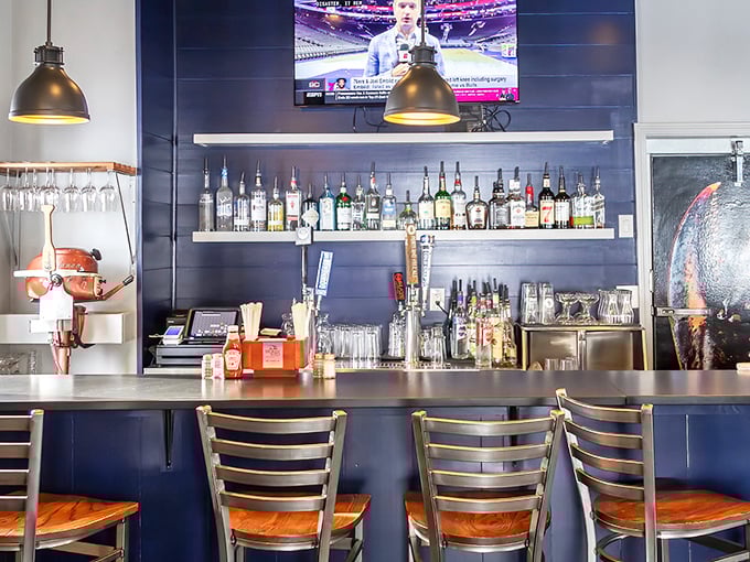 The sleek bar area offers front-row seats to Maine's liquid treasures—craft beers, wines, and cocktails that complement rather than compete with the seafood.