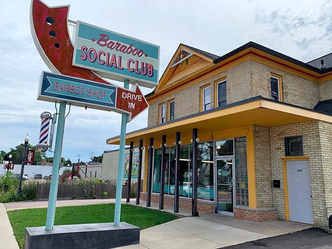 The Baraboo Social Club's vintage sign promises exactly what small-town retirement dreams are made of: community, conversation, and maybe a haircut too.