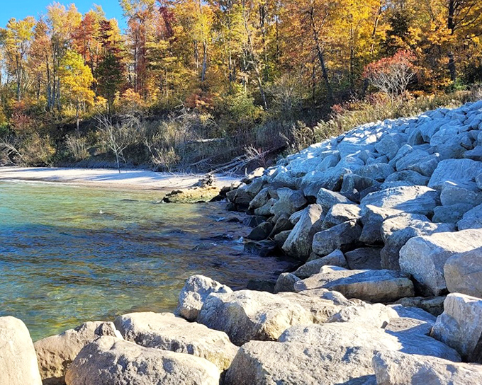 Rocky shoreline meets crystal waters in nature's version of mixed textures &ndash; a designer would charge thousands for this aesthetic.
