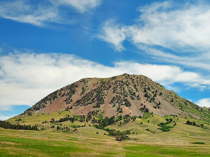 Bear Butte rises from the plains like nature's monument, a geological celebrity that's been turning heads for millions of years.