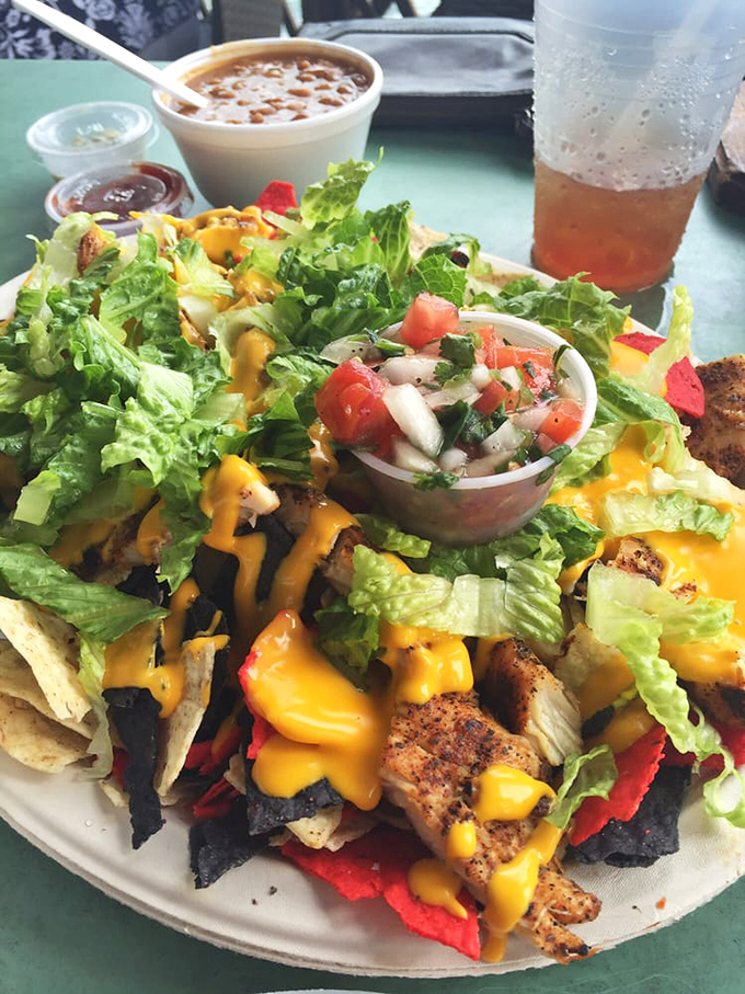 These nachos aren't messing around. Blackened chicken, melty cheese, and enough toppings to make each bite a different experience.