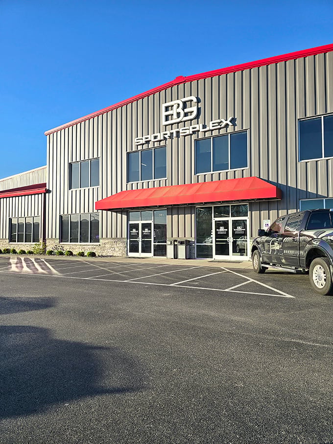 Bluegrass Sportsplex stands ready for action, its red awnings beckoning athletes of all ages to come play regardless of the weather.