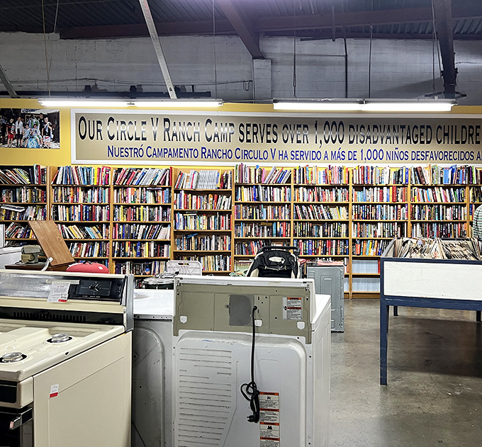 Books upon books beneath a reminder of purpose&mdash;this retail therapy actually helps disadvantaged children too.