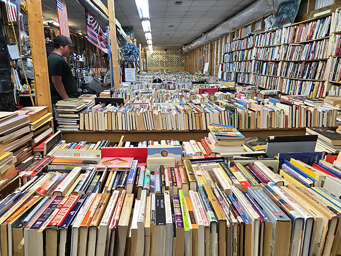 Bibliophile's dream! Thousands of books create a paper labyrinth where time disappears faster than your Saturday afternoon plans.