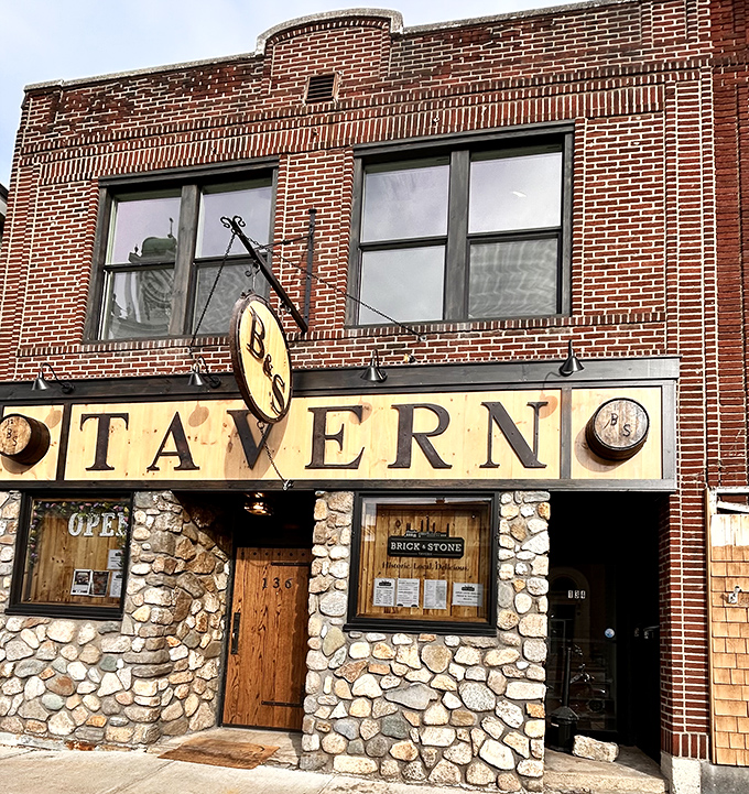 The Brick & Stone Tavern's rustic facade promises exactly what you're hoping for &ndash; cold beer, warm conversation, and zero pretension.