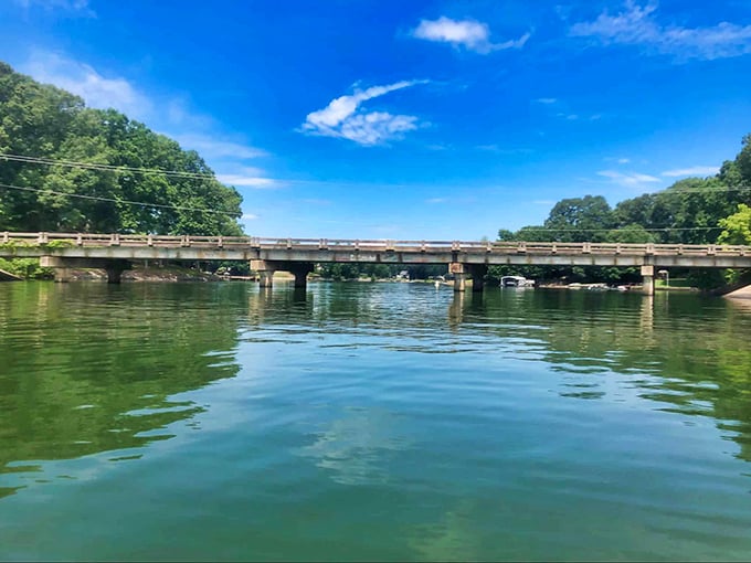 This bridge spans calm waters that have witnessed countless fishing stories&mdash;most of them growing more impressive with each retelling.
