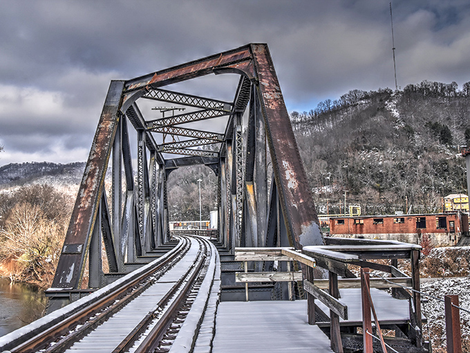 This weathered railroad bridge has carried more coal, stories, and history than most metropolitan museums could ever hope to display.