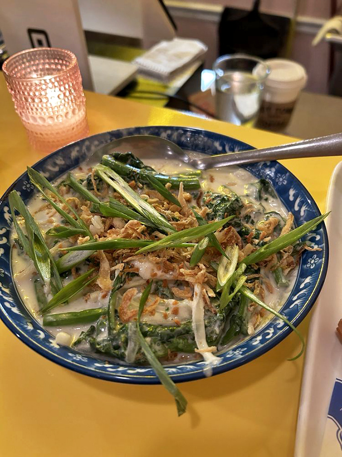 A verdant bowl where greens meet creamy sauce in a textural dance, proving vegetables can party just as hard as their meaty counterparts.