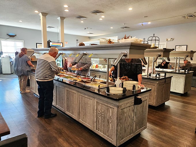 The buffet's grand design – where hungry patrons contemplate their strategy like generals planning a delicious campaign through comfort food territory.