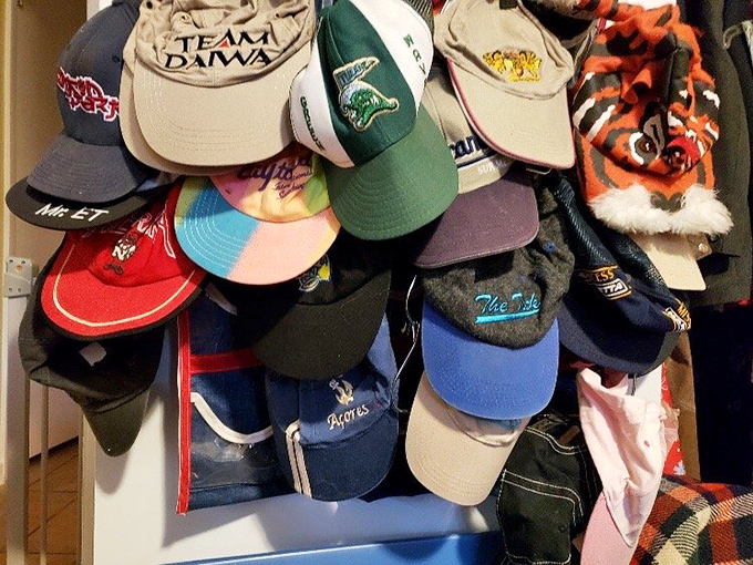 The hat wall tells Mississippi stories &ndash; from fishing adventures to sports loyalties, each cap represents someone's passion now waiting for a new head.