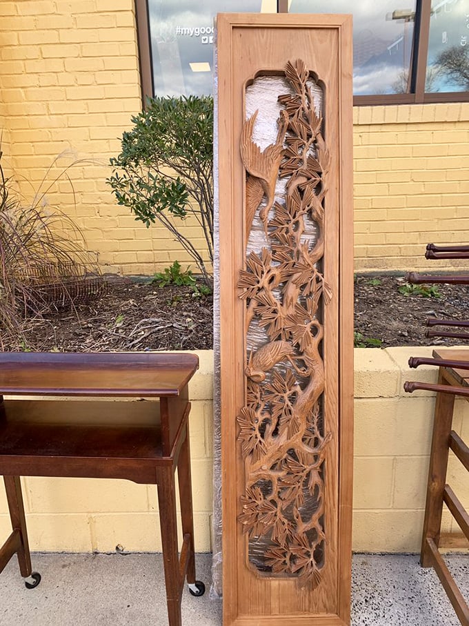 Carved wooden artistry that transforms a blank wall into a conversation piece &ndash; someone's loss becomes your decorating triumph.