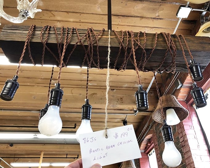 Edison would approve of this rustic beam light fixture. Industrial chic before it was cool, now ready to illuminate your dining table.