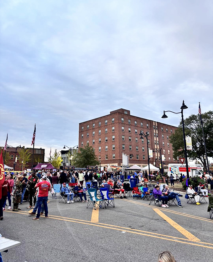 Community festivals transform ordinary streets into extraordinary gathering places where lawn chairs become thrones and everyone's a local, even if just for a day.