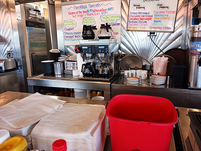 Coffee station command central, where refills flow like conversation between old friends who just met five minutes ago.