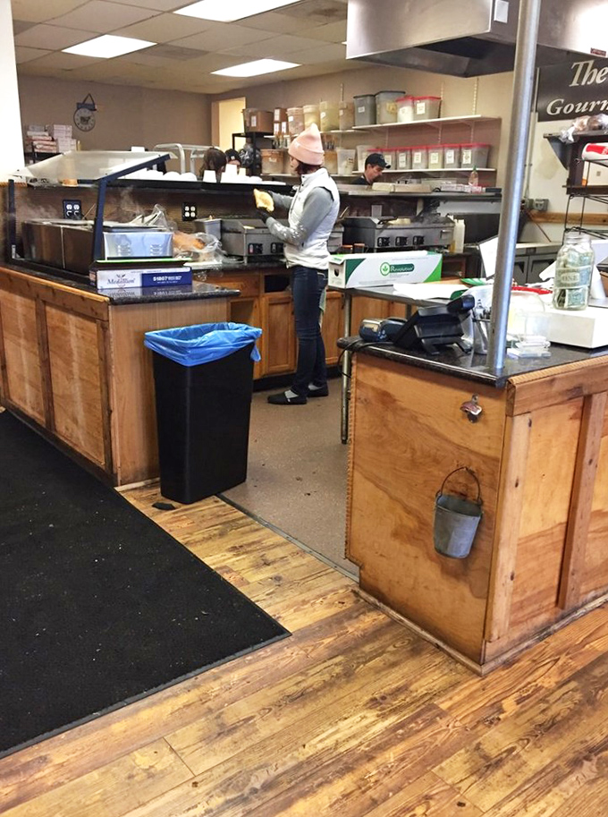 In the kitchen, sandwich artisans work their magic. No fancy chef whites needed when you've got skills that speak louder than uniforms.