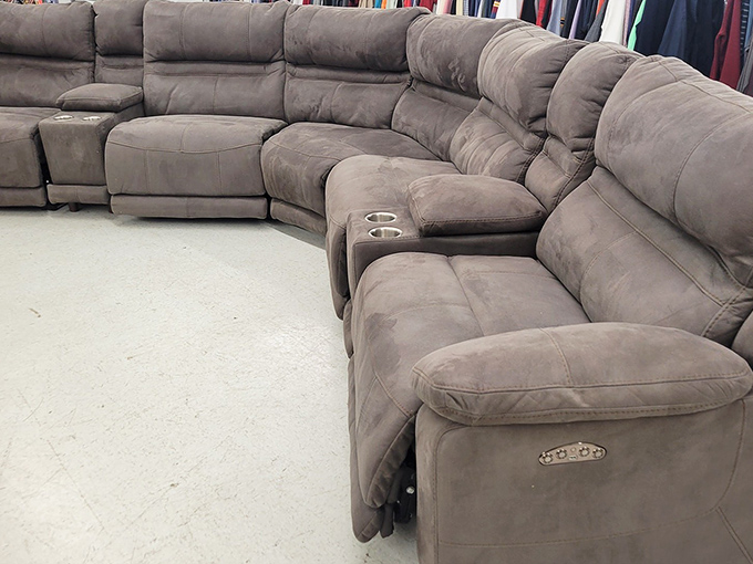 The sectional sofa of dreams. This plush gray number has cup holders—the universal sign that furniture designers understand what really matters.