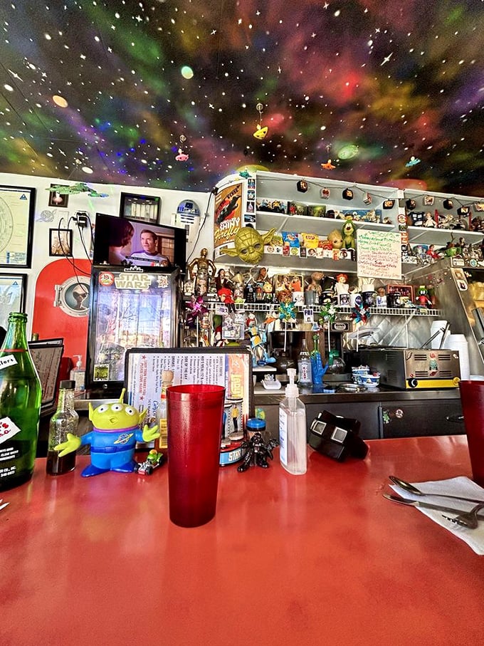 The counter area feels like mission control for flavor, with collectible figures standing guard over each culinary launch.