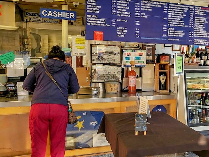 The ordering counter&mdash;where seafood dreams begin. Simple, efficient, and promising ocean-fresh delights without unnecessary frills.
