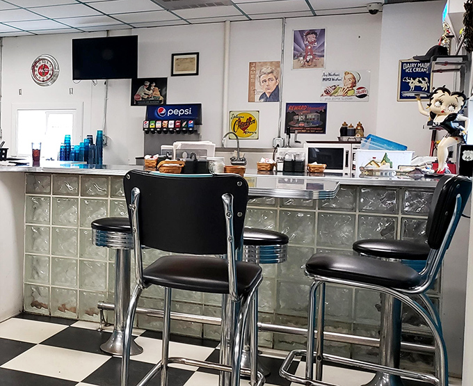 The counter with its glass blocks and chrome stools isn't just seating &ndash; it's front-row tickets to the greatest show on earth: breakfast.