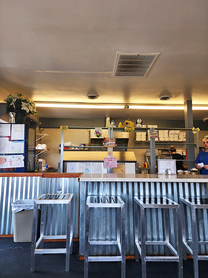 Counter seating that invites conversation with strangers who quickly become friends united by their love of great coneys.