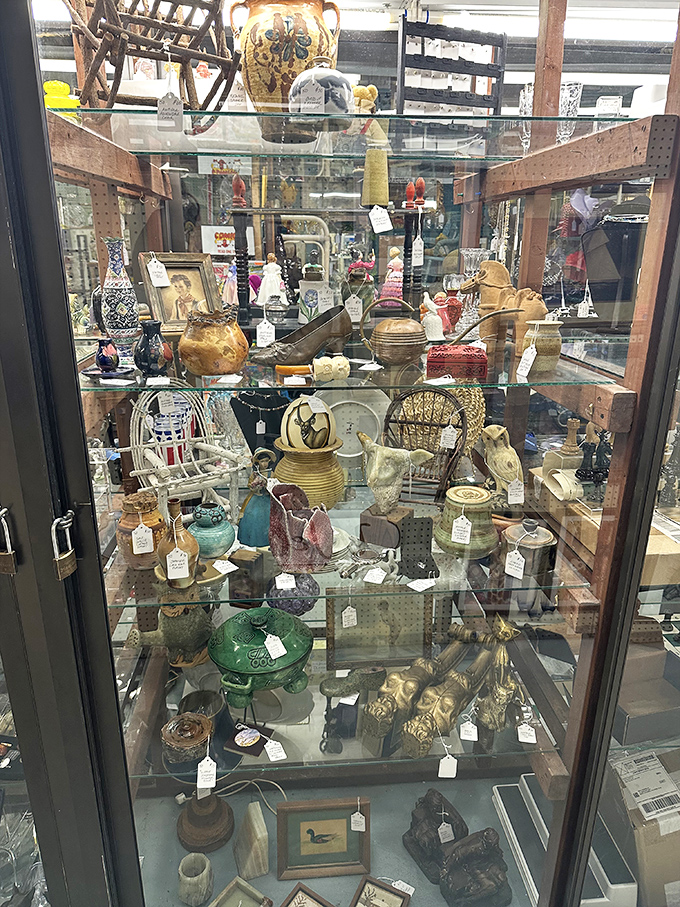 This display case is like a snow globe of American history&mdash;each shelf a different decade, each item a story.