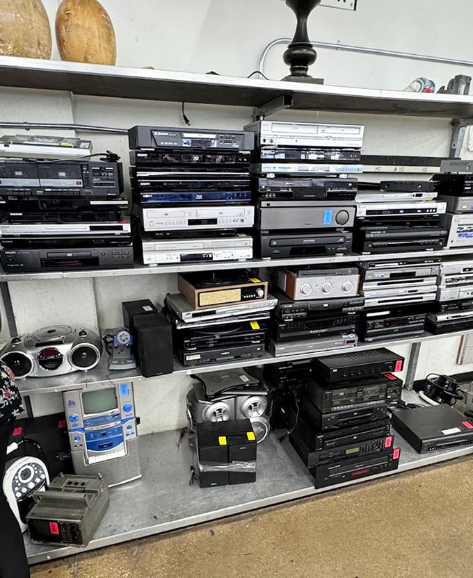 The electronics section – where VCRs, DVD players and stereo components form a museum of recent technological history at clearance prices.