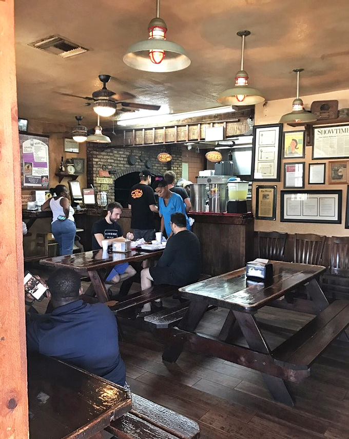 The picnic tables say "stay awhile" while the aromas say "order everything." Smart diners come hungry and leave euphoric.