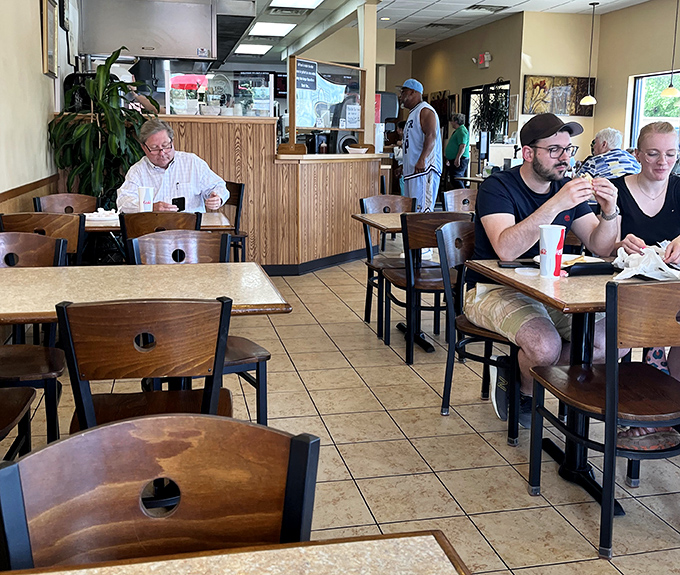 The dining room hums with the satisfied murmurs of locals who've made this their regular spot.