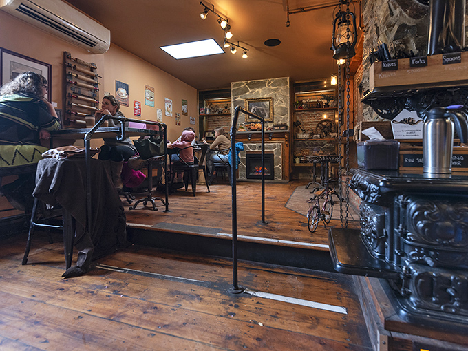 The cozy interior where strangers become friends over shared tables and the mutual understanding that great food is worth the journey to Birchrunville.