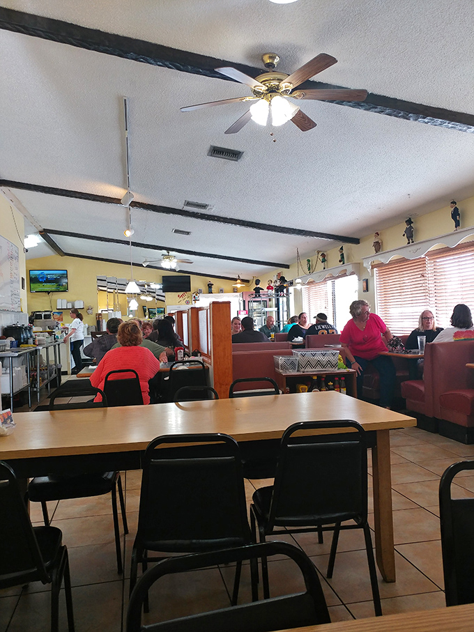 Inside Peggy's, the yellow walls and wooden booths create the perfect backdrop for morning conversations and coffee refills.