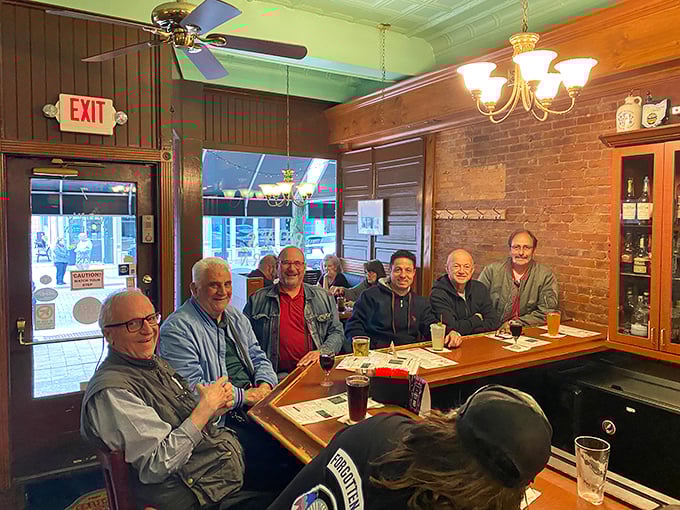 At Ron's, regulars gather at the bar like they're attending a reunion where everyone actually wants to be there. The conversation flows as freely as the drinks.