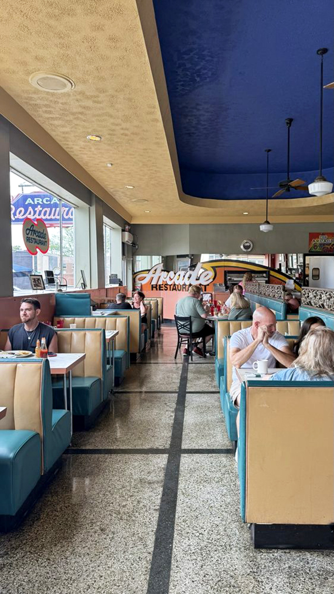 Where strangers become neighbors over coffee and conversation, these turquoise booths have witnessed decades of Memphis morning rituals.