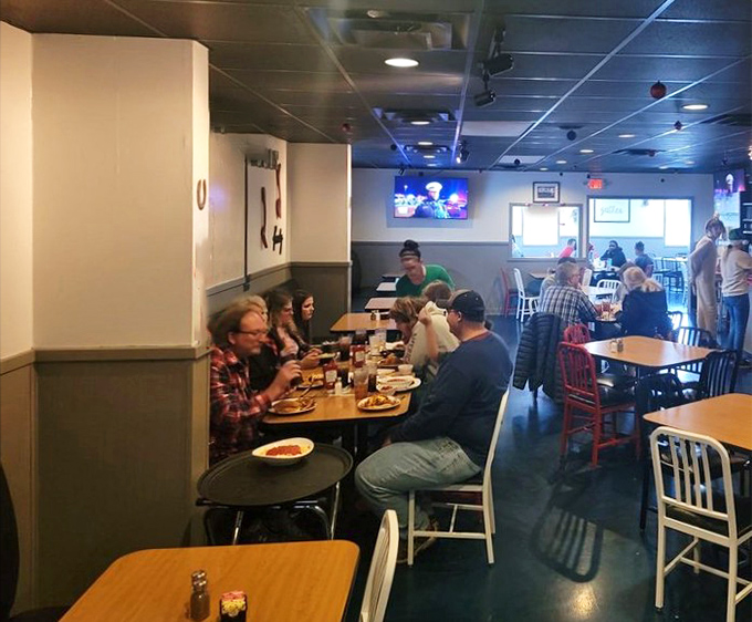 Where strangers become temporary family, united by the universal language of "mmm" and "you've got to try this." The Dark Horse dining experience in full swing.