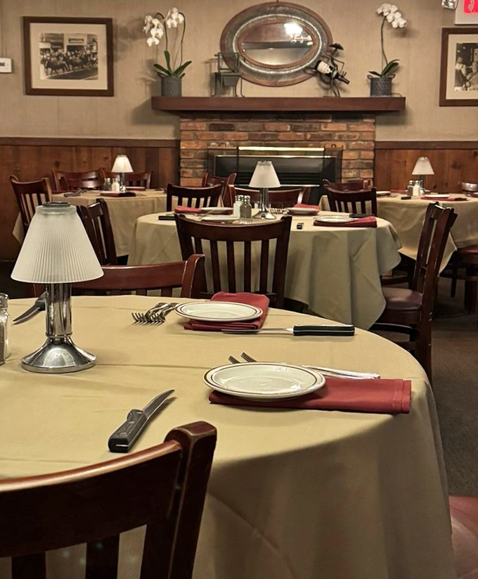 Tables set with military precision and classic table lamps create that "welcome home to dinner" feeling we all secretly crave.