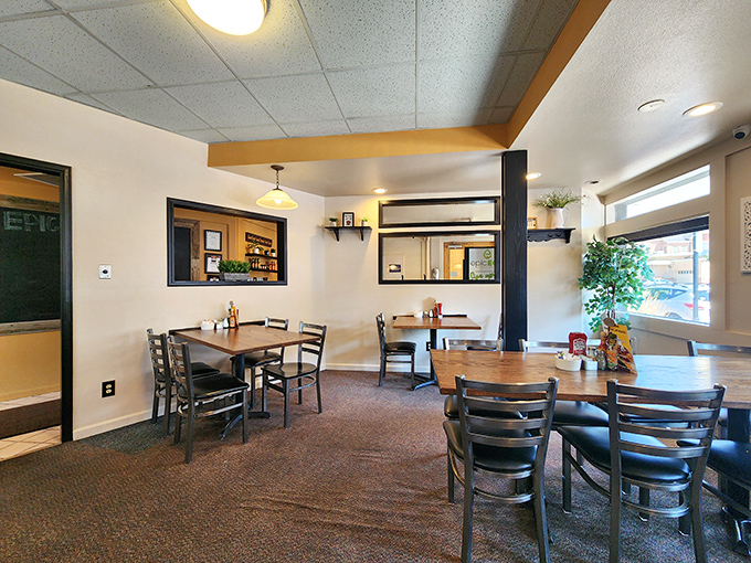 Clean lines, warm wood tones, and thoughtful spacing between tables&mdash;because nobody wants to accidentally join a stranger's breakfast conversation.