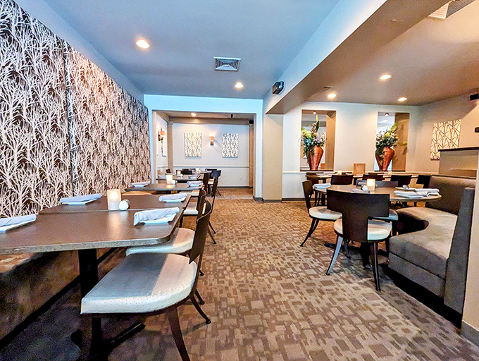 The dining room at Grille 3501 balances elegance with comfort, like wearing your favorite sweater to the opera. Somehow, it just works.