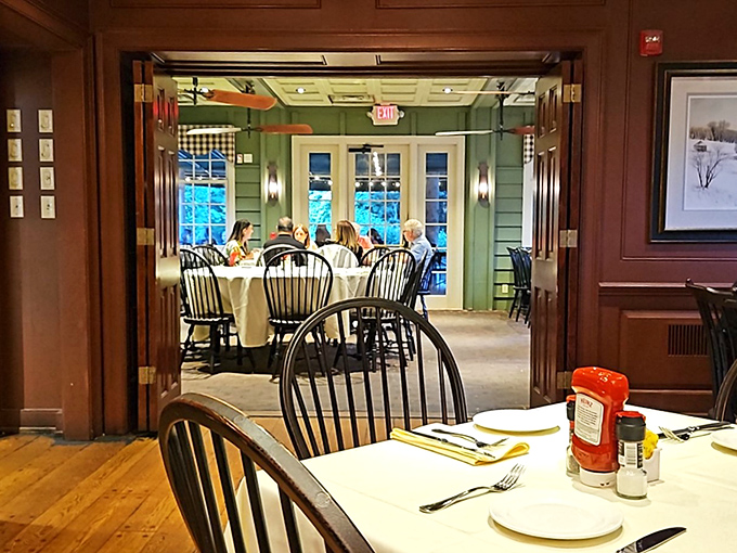 Dining rooms flow into one another with the organic grace of a place that's evolved naturally over time, each space offering its own distinct character.