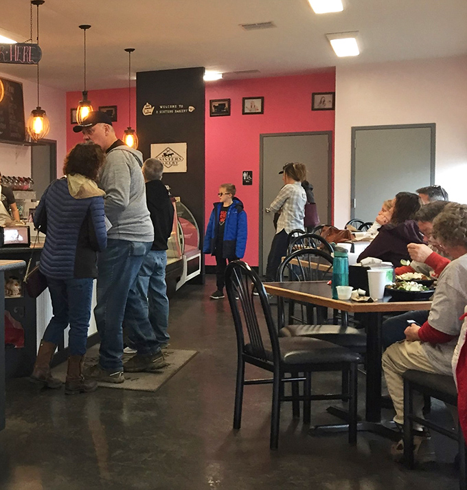 The dining area isn't just tables and chairs; it's a community gathering spot where strangers become neighbors over shared sugar highs.