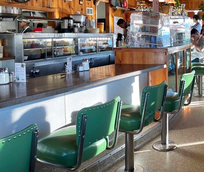 The counter seats&mdash;where solo diners become regulars and the breakfast show unfolds before your eyes in sizzling, aromatic glory.
