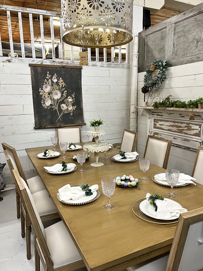 A farmhouse dining tableau that whispers "come, sit, stay awhile" &ndash; staged so perfectly you can almost smell Sunday dinner.